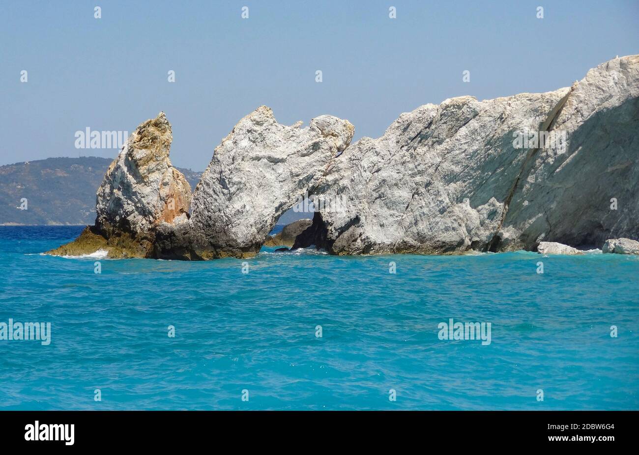 Sunny rock formation around Lalaria beach in Skiathos, one of the greek ...
