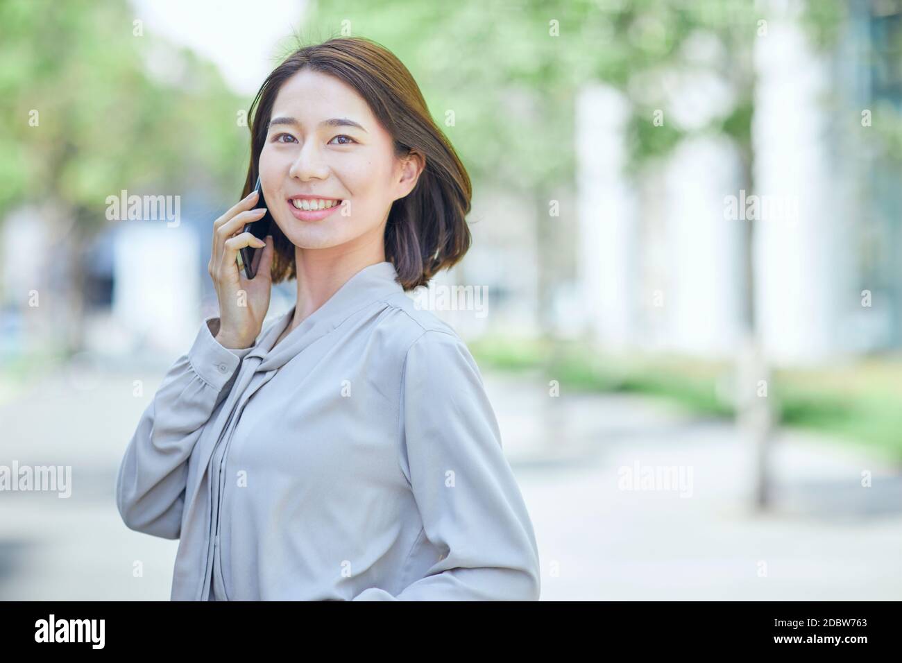 Young Japanese Woman Calling Stock Photo - Alamy