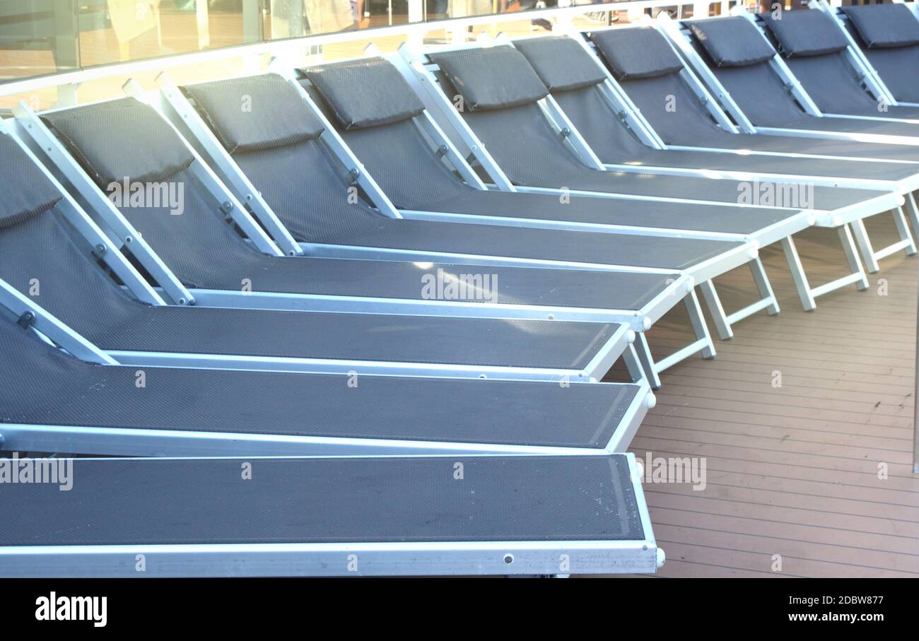 Empty deck chairs on the upper deck of a cruise ship, NOBODY, OUTDOOR ...