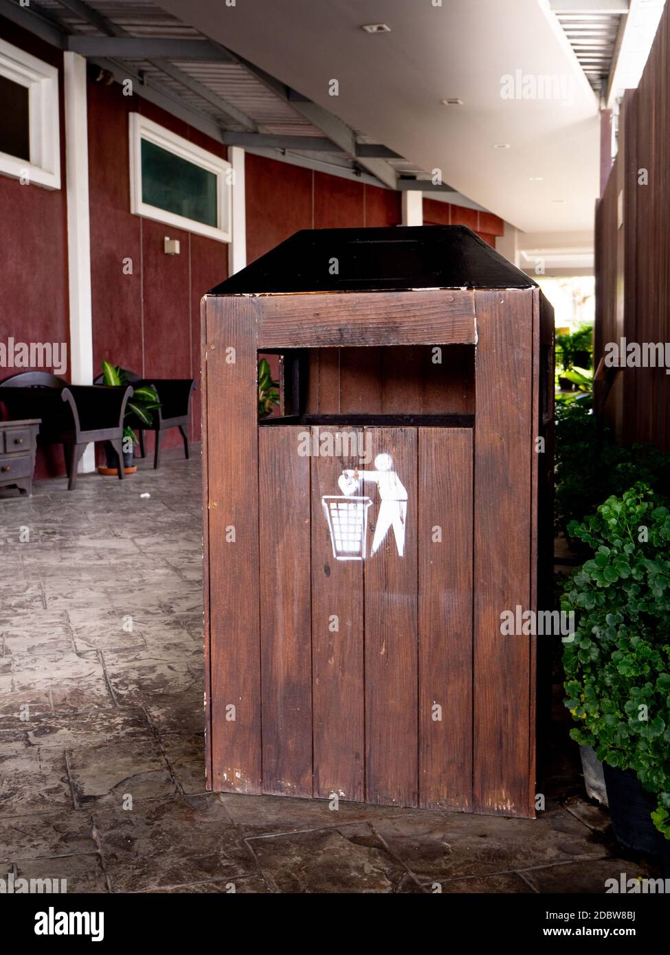 Vintage Wood trash bin design to prevent be wet from rain Stock Photo ...