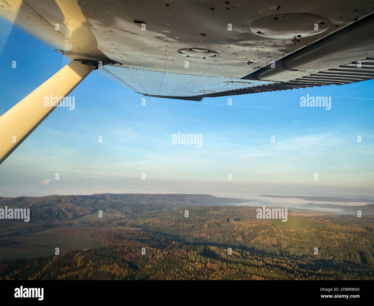 Beautiful aerial view of countryside during sunset from a Cessna Plane ...