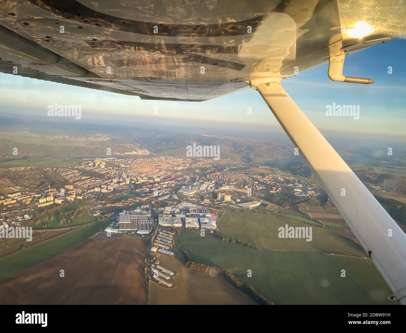 Beautiful aerial view of countryside during sunset from a Cessna Plane ...