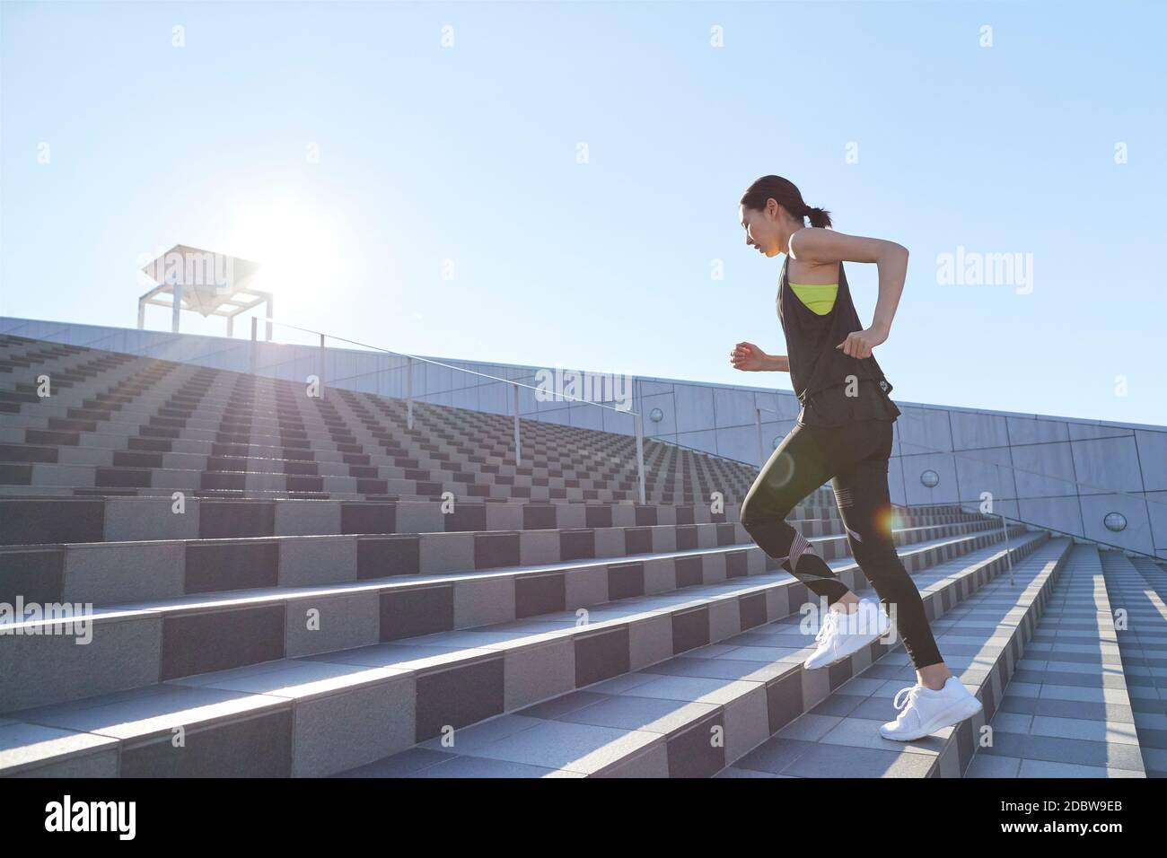 Young Japanese Woman Running Downtown Tokyo, Japan Stock Photo - Alamy