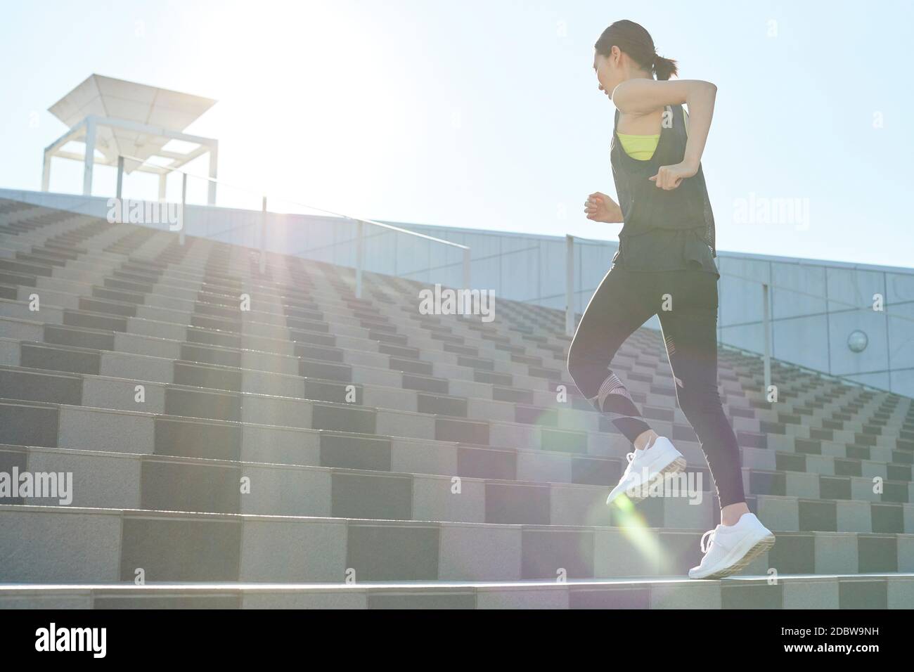 Young Japanese Woman Running Downtown Tokyo, Japan Stock Photo - Alamy