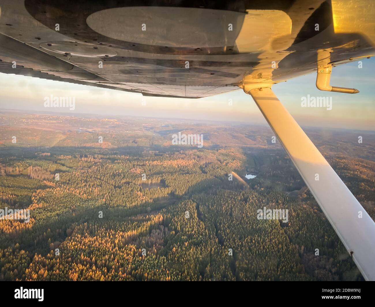 Beautiful aerial view of countryside during sunset from a Cessna Plane ...