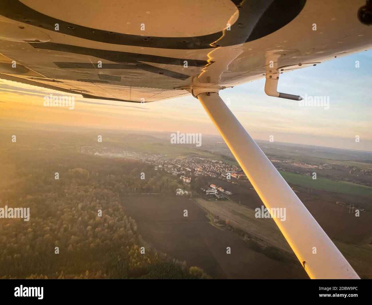 Beautiful aerial view of countryside during sunset from a Cessna Plane ...