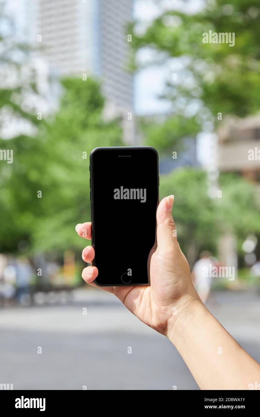 Hand Holding Smartphone Stock Photo - Alamy