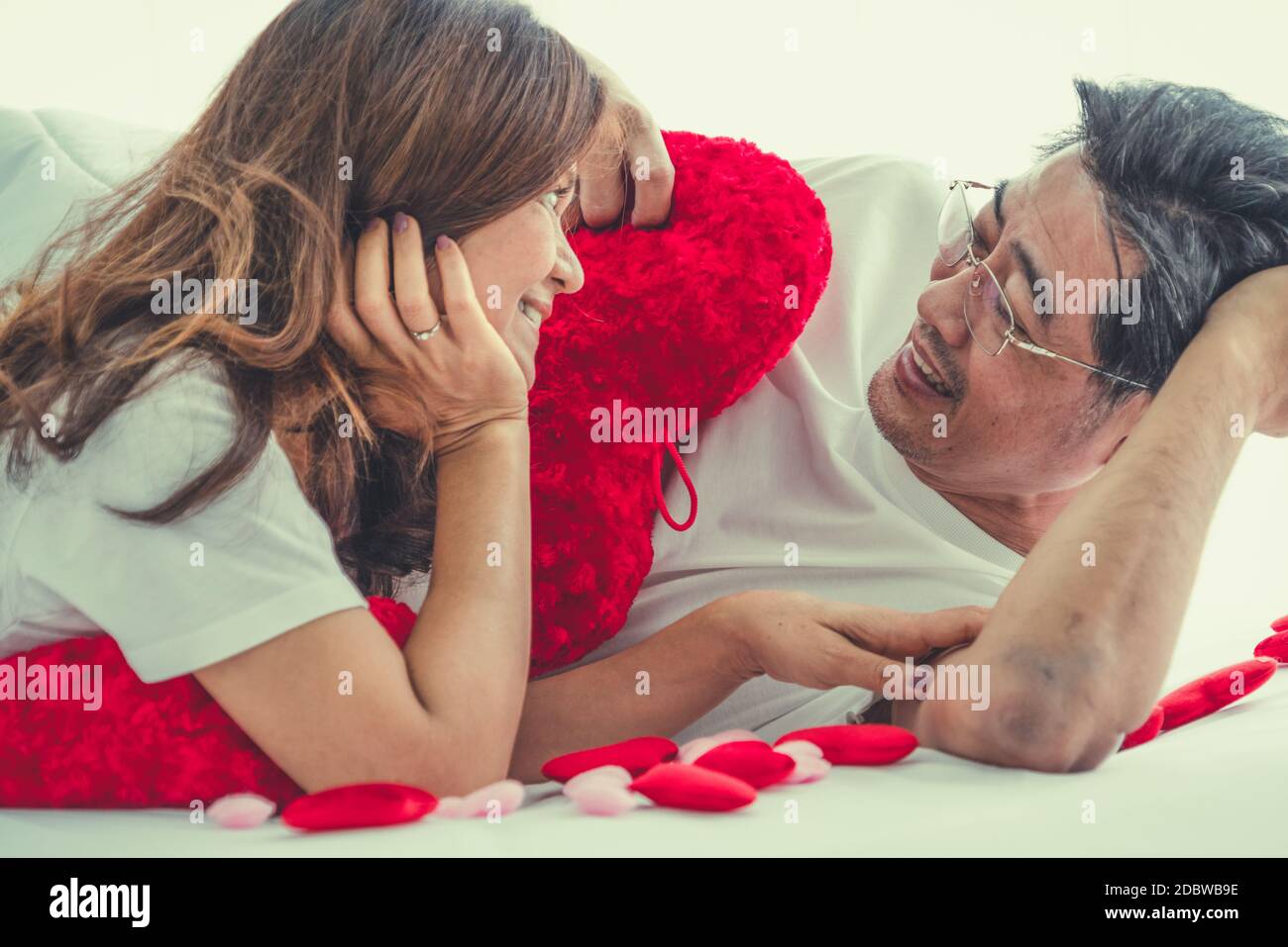Happy Asian Senior Couple Having Good Time At Home Old People
