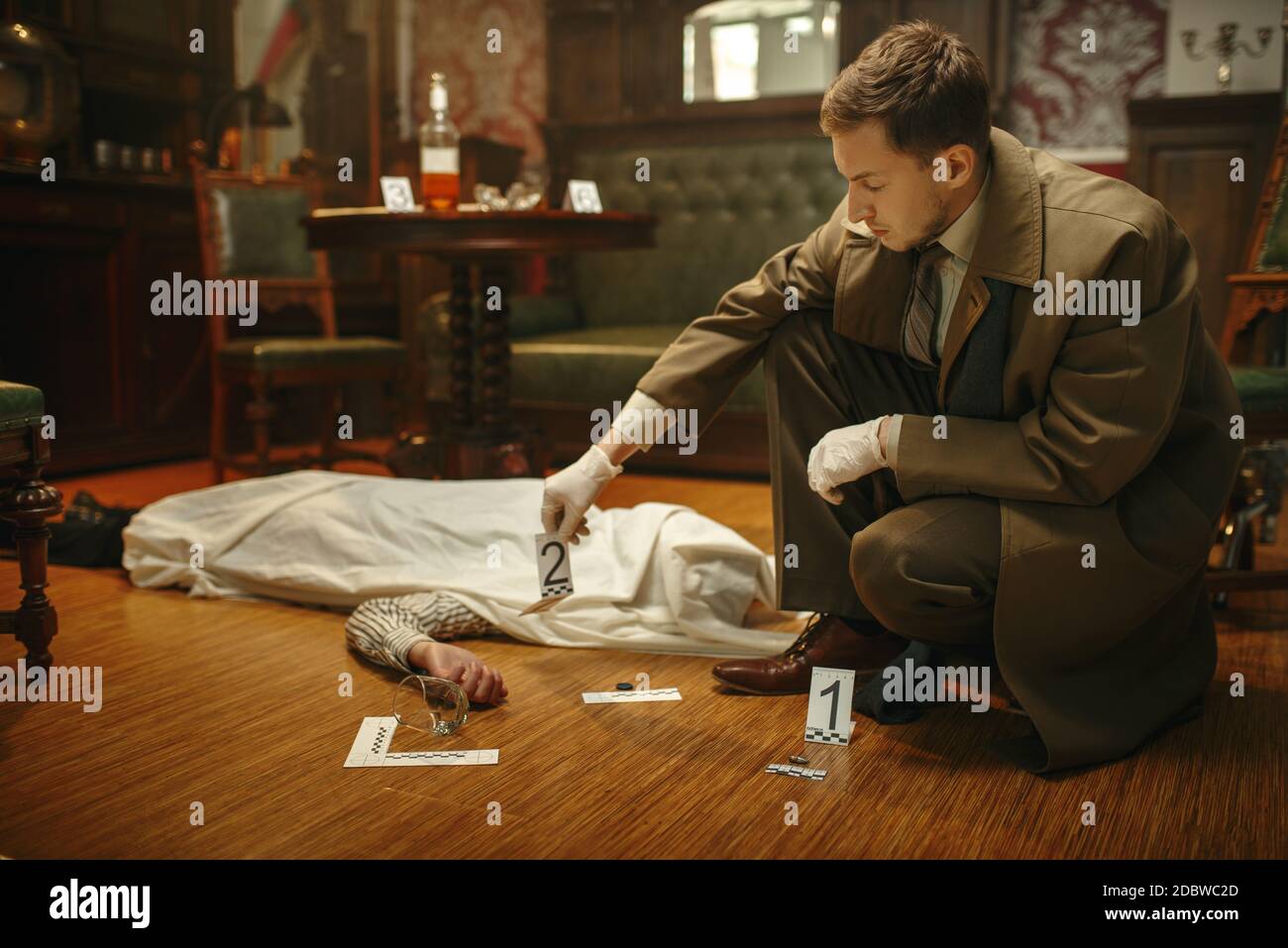Male detective in gloves looking evidence at the crime scene, retro ...
