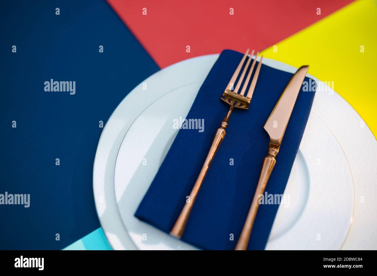 Table setting, silverware on the plate closeup, top view, nobody ...