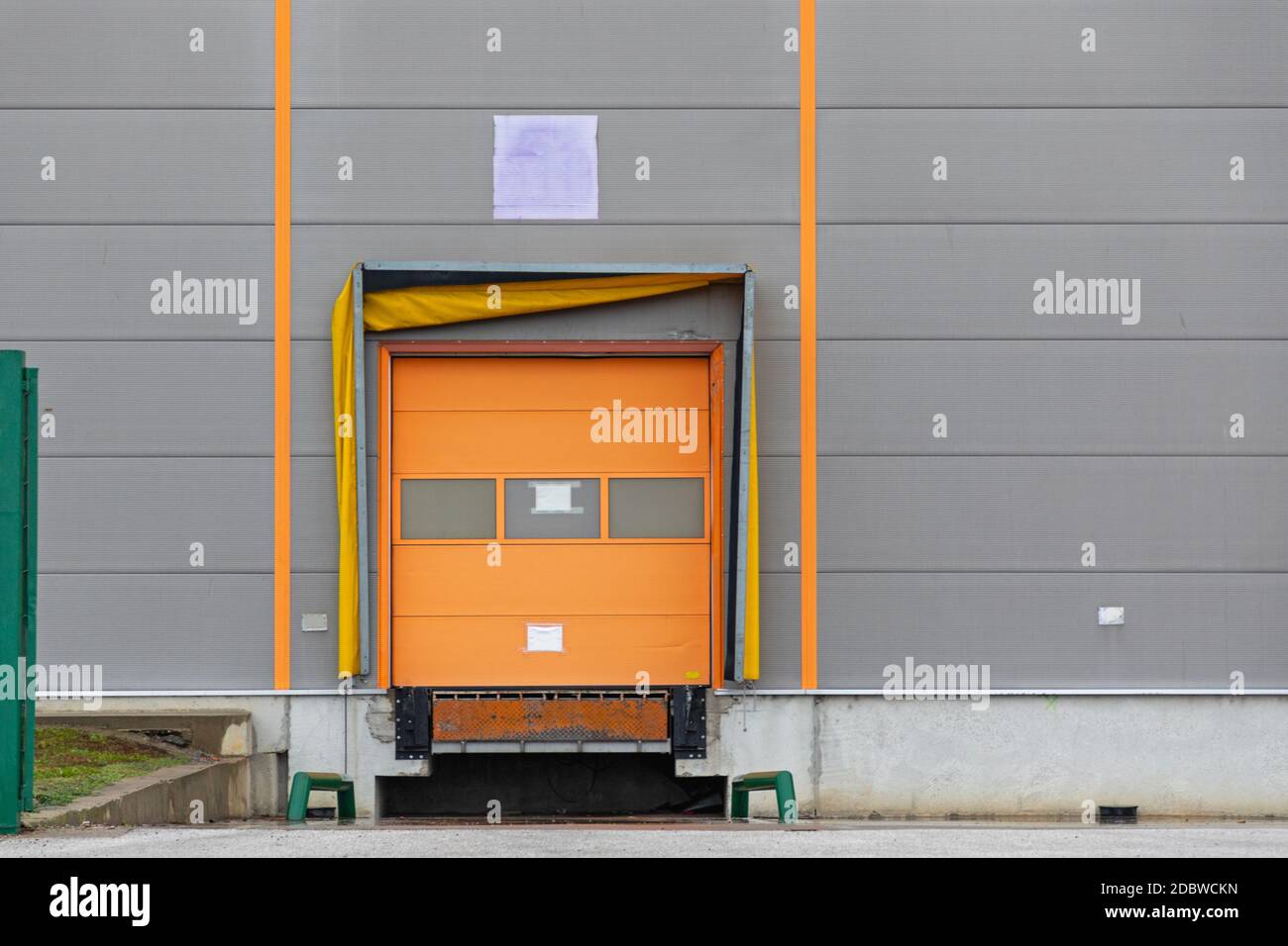 Loading Cargo Dock Door at Distribution Warehouse Stock Photo - Alamy