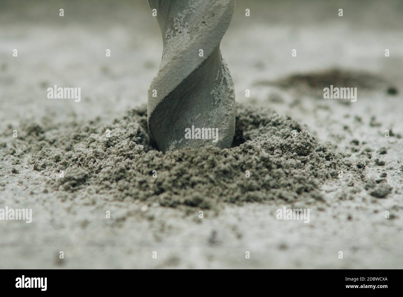detail of a drill working in concrete Stock Photo - Alamy