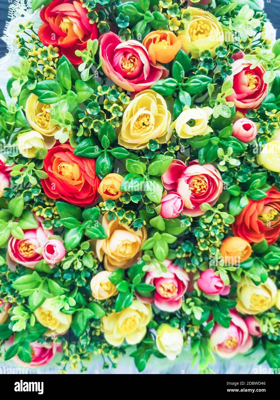 Various color flower artificial background. Colorful flower plastic ...