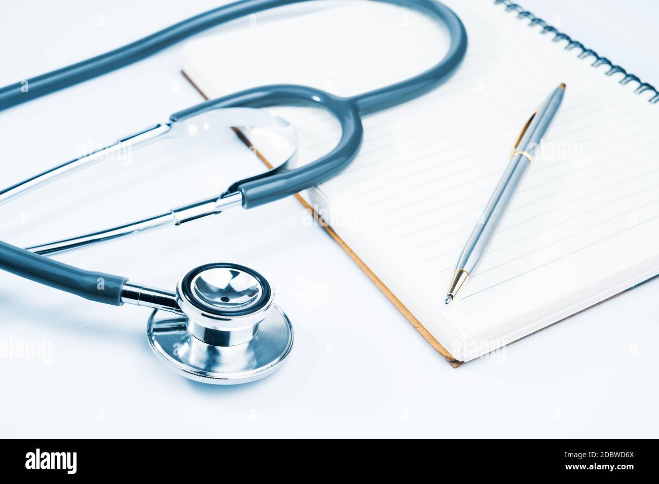 Medical stethoscope on blank notepad as medical concept Stock Photo - Alamy