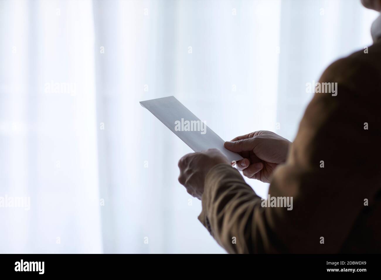 Man Holding Letter Stock Photo - Alamy