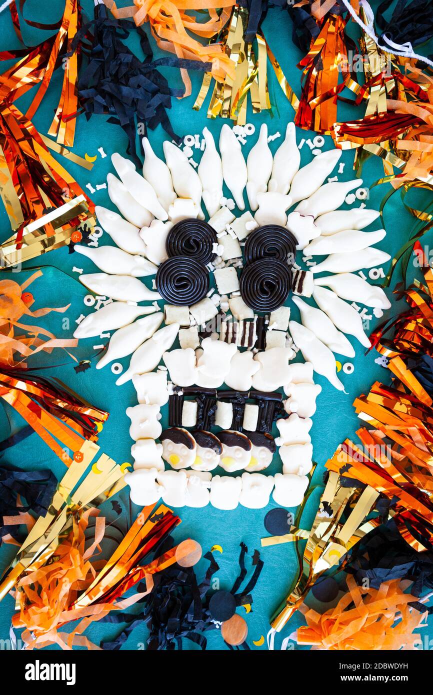 Colorful Halloween candy arranged in a skull shape Stock Photo - Alamy