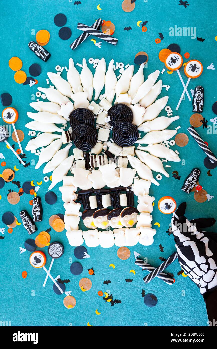 Colorful Halloween candy arranged in a skull shape Stock Photo - Alamy