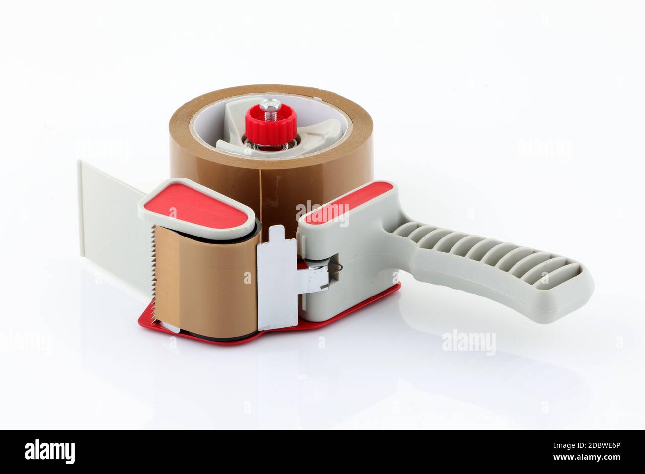 A Parcel tape dispenser laid on white background Stock Photo - Alamy