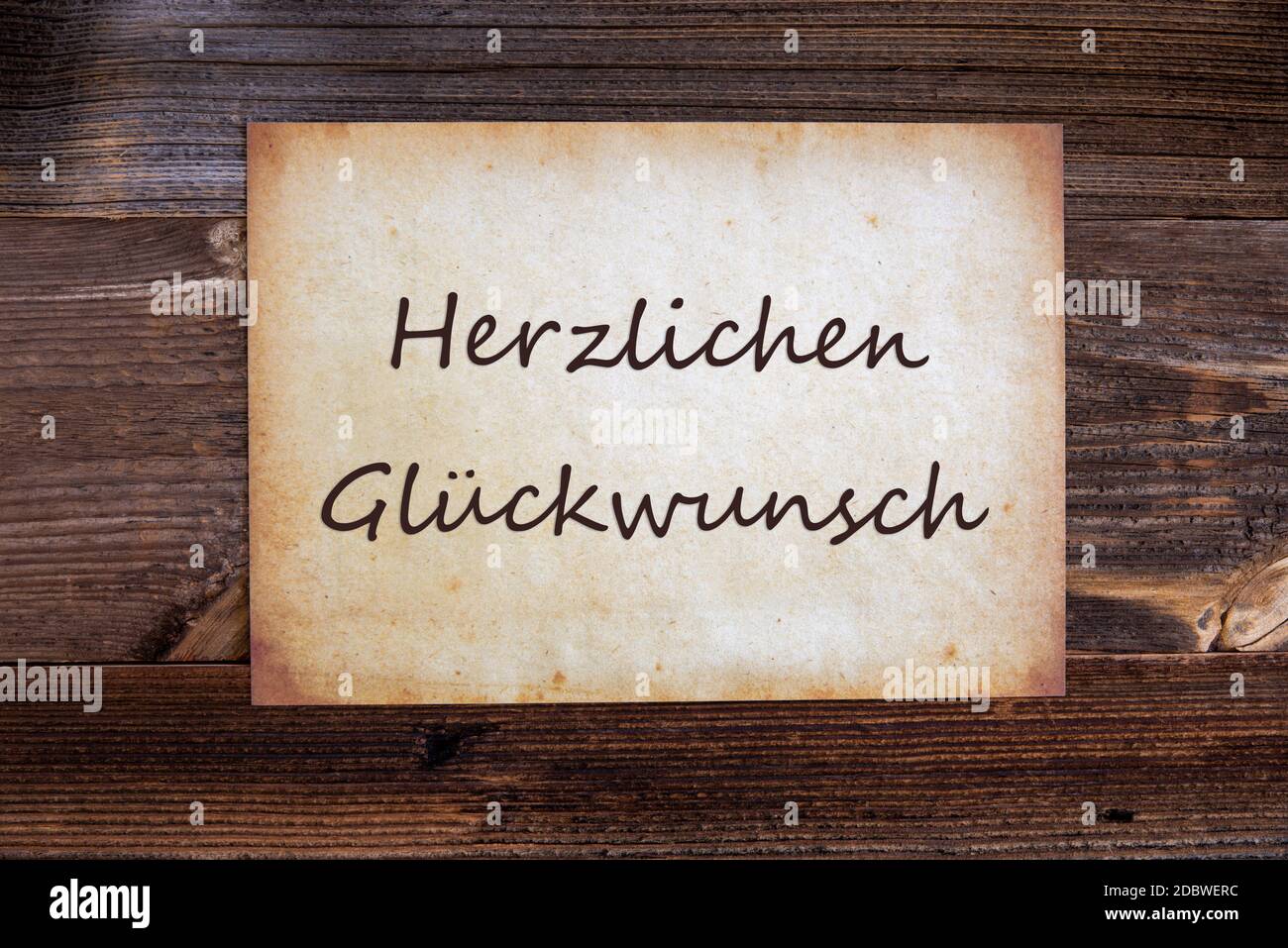 Old Grungy Paper With German Text Herzlichen Glueckwunsch Means ...