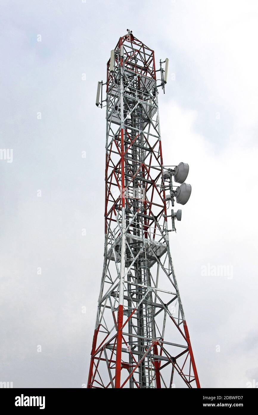 Very tall structure of communication antenna tower Stock Photo - Alamy