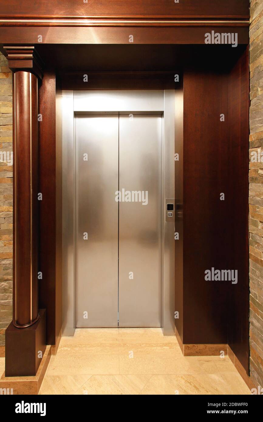 Closed door at new modern elevator Stock Photo - Alamy