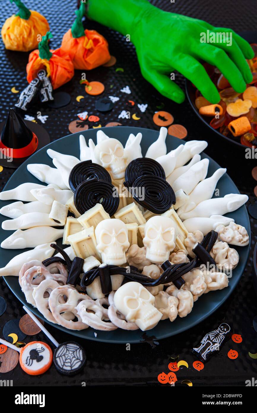 Colorful Halloween candy arranged in a skull shape Stock Photo - Alamy