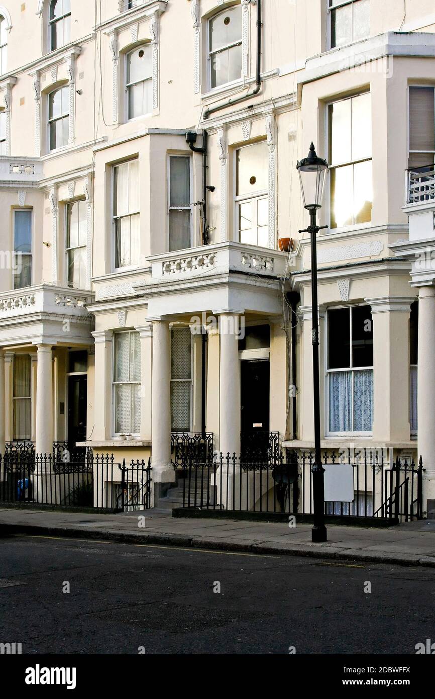 Empty London streets with row of Victorian houses Stock Photo - Alamy
