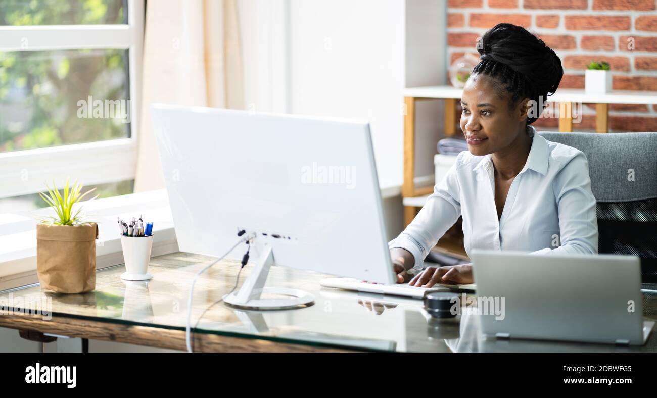 Happy Professional Woman Employee Using Computer For Work Stock Photo ...