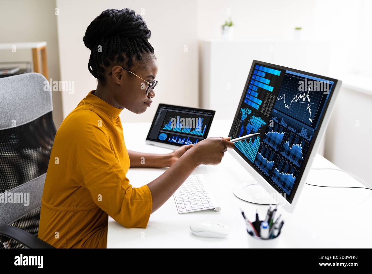 African American Business Data Analyst Woman Using Computer Stock Photo ...