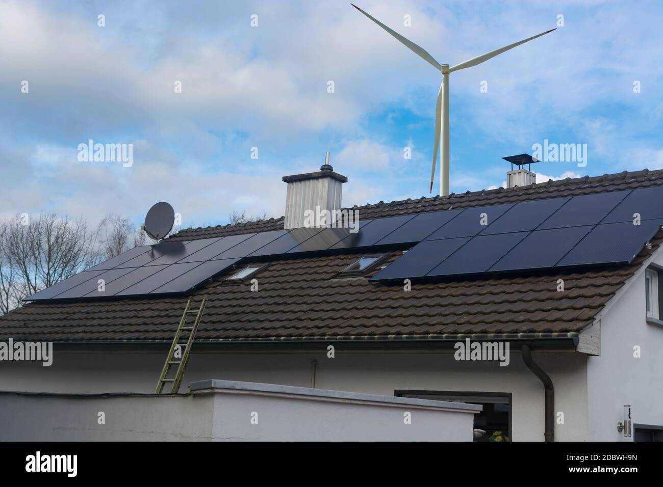 Modern house with a photovoltaic system, solar panels for electricity ...