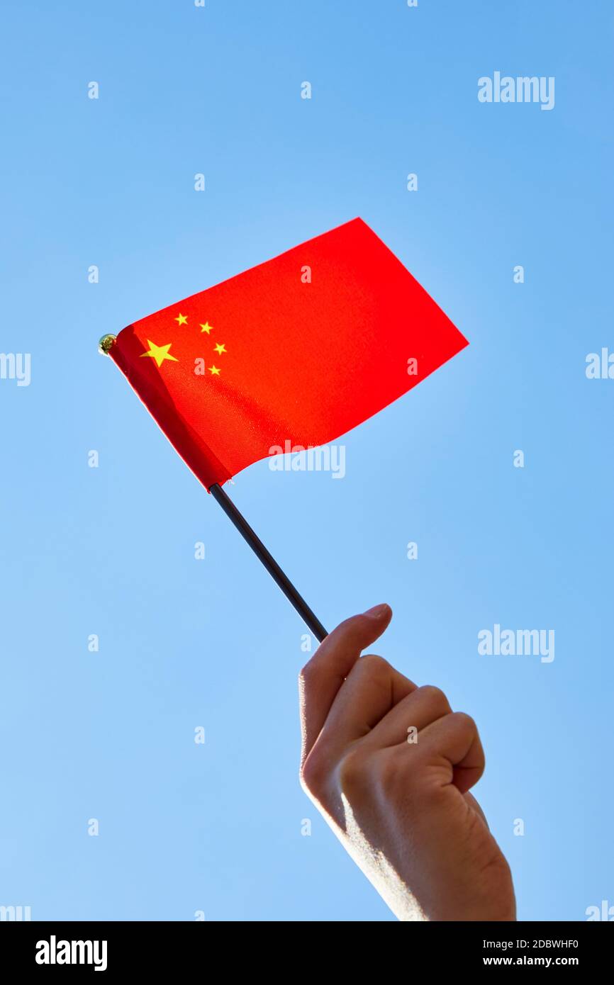Hand With Chinese Flag Stock Photo - Alamy