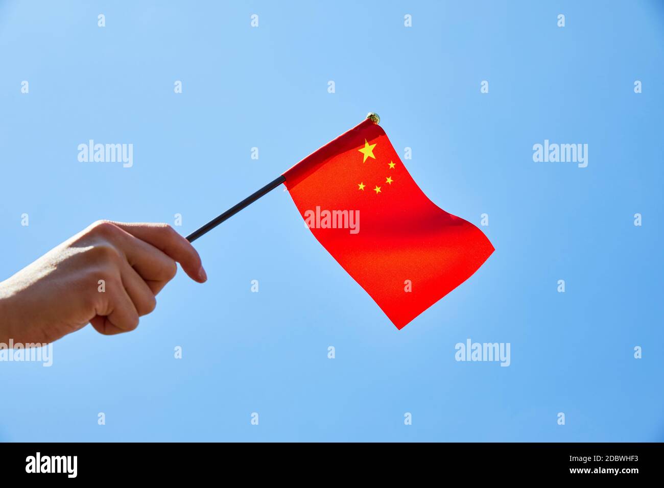 Hand With Chinese Flag Stock Photo - Alamy
