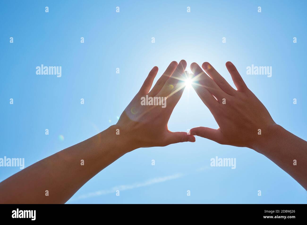 Raised Hand To The Sky Stock Photo - Alamy
