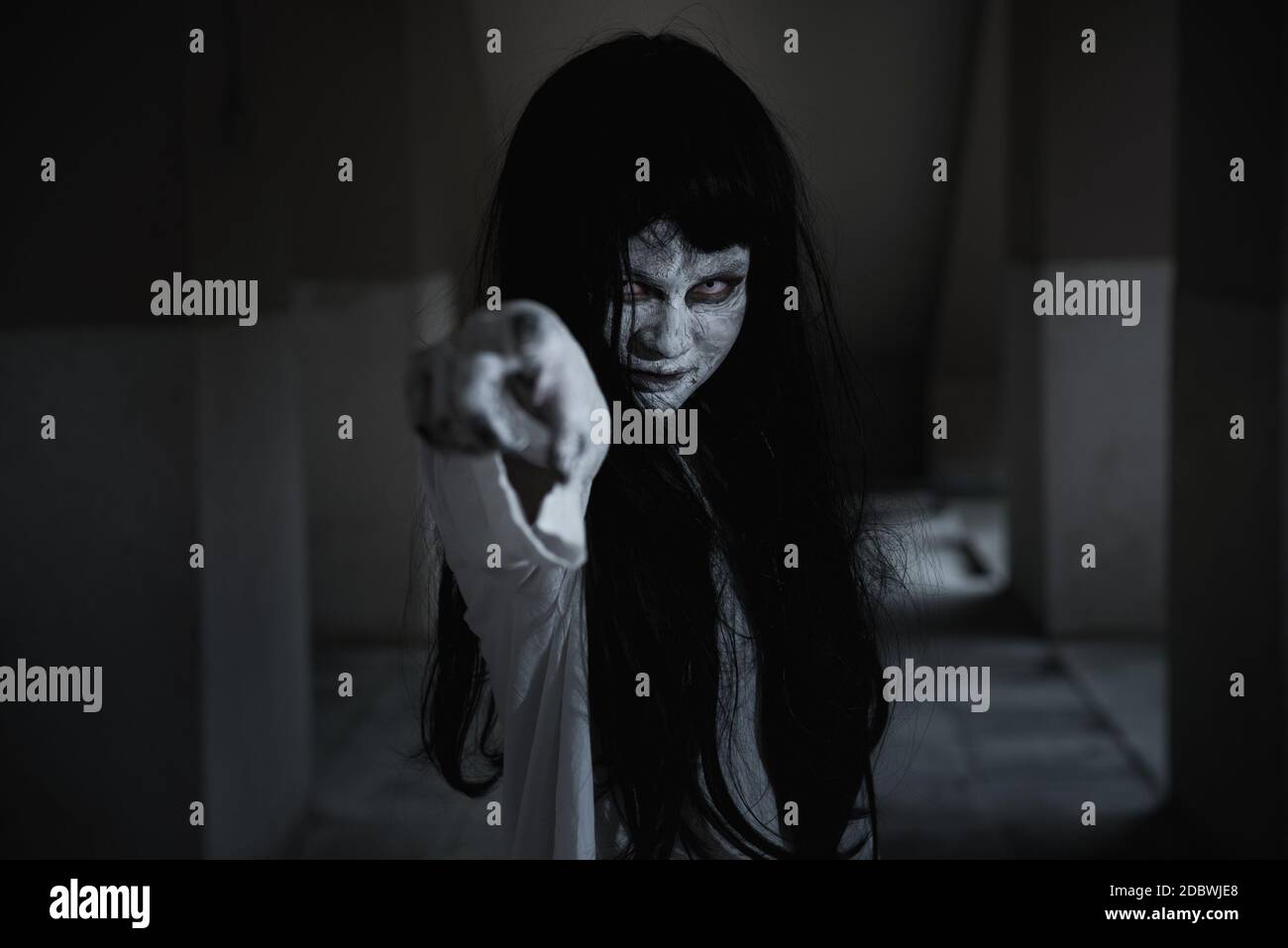 Woman ghost horror her finger point your face, halloween concept Stock ...