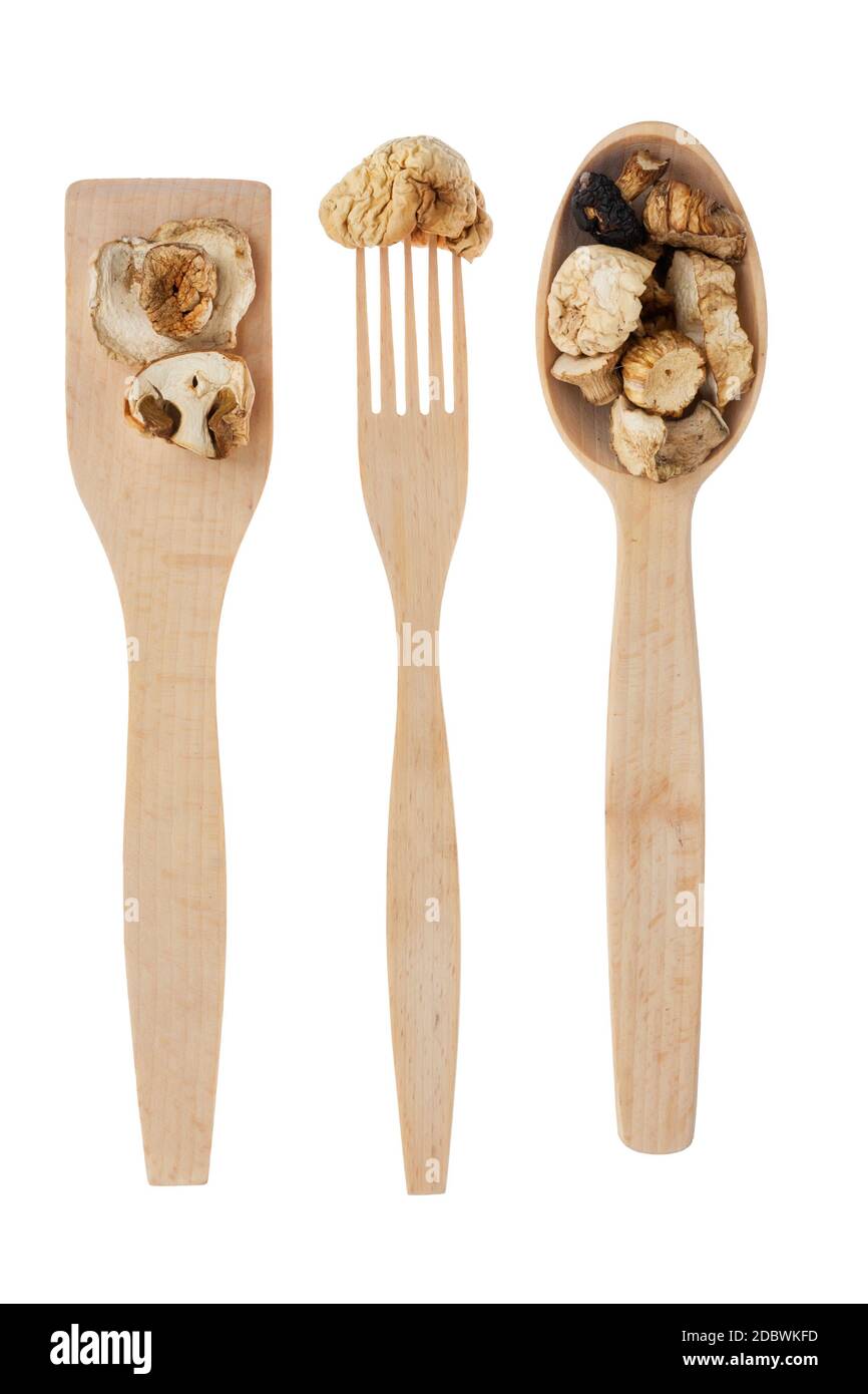Wooden spoon, fork, paddle with mushroom, isolated on white background ...