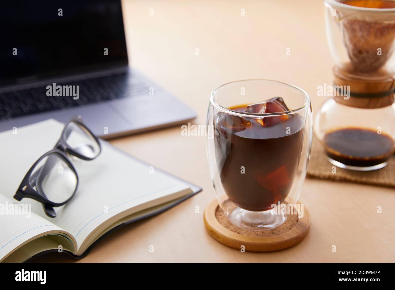 Glass Of Coffee On The Desk Stock Photo - Alamy
