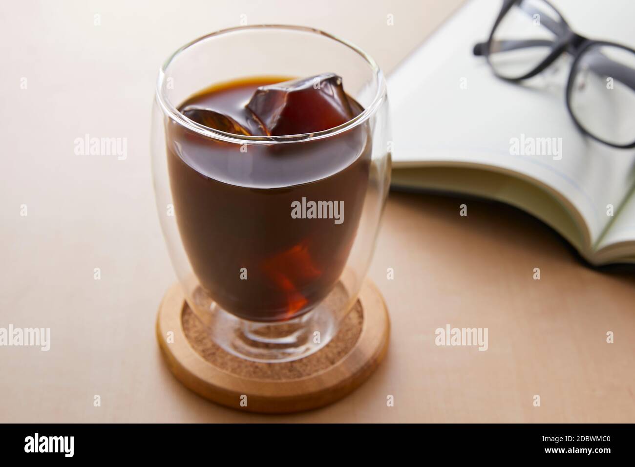 Glass Of Coffee On The Desk Stock Photo - Alamy