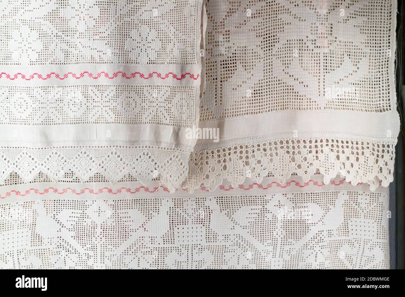 Traditional folk art knitted embroidery pattern on textile fabric ...