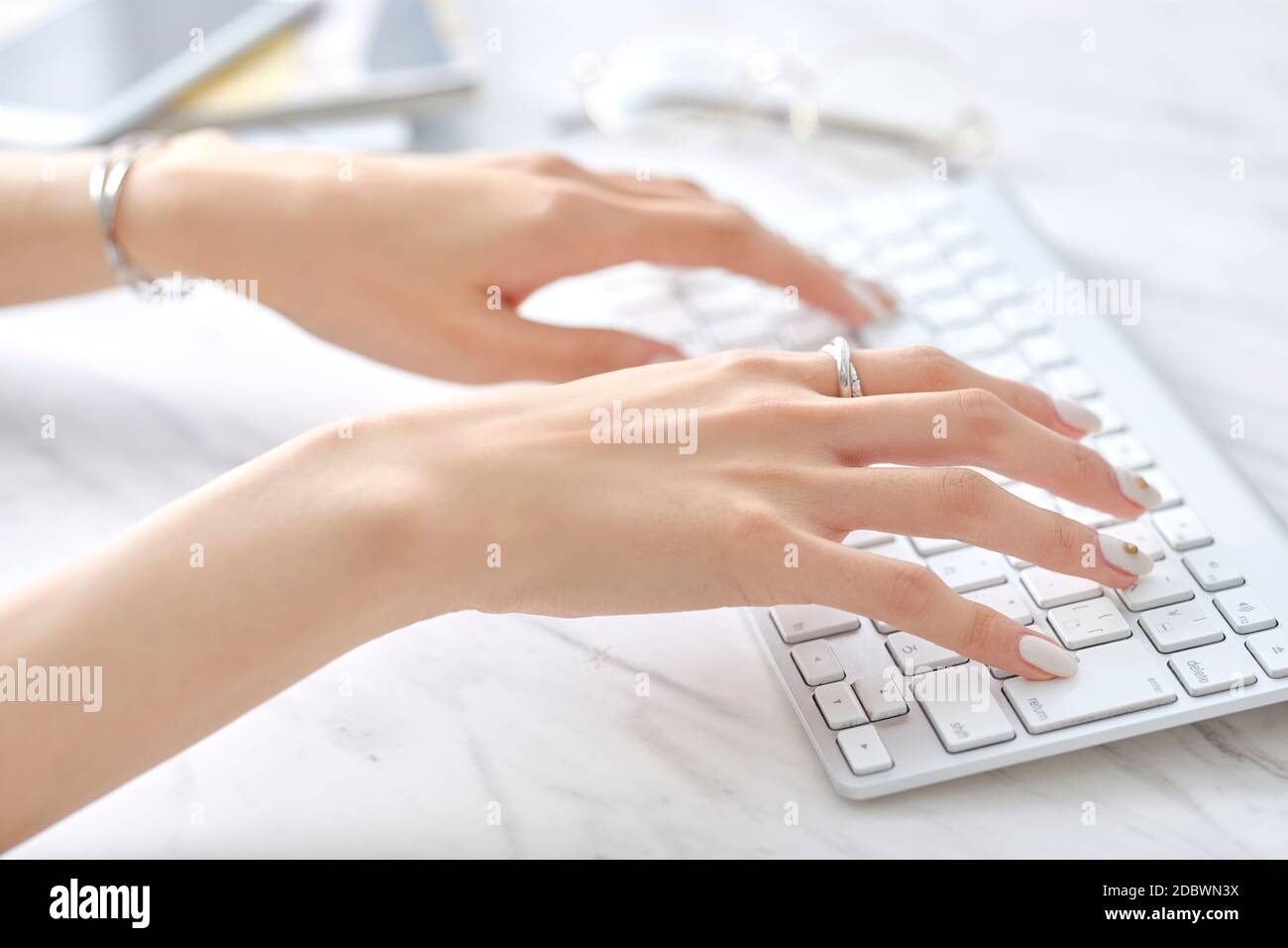 Woman Working With Keyboard Stock Photo - Alamy