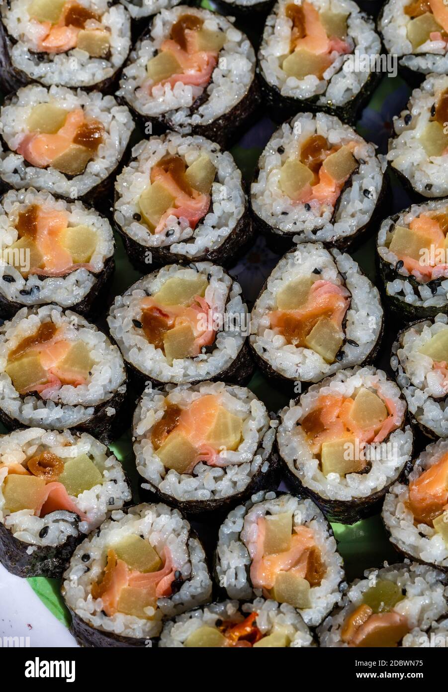 Top view of stack of Japanese sushi maki roll plate. Served in Japanese ...