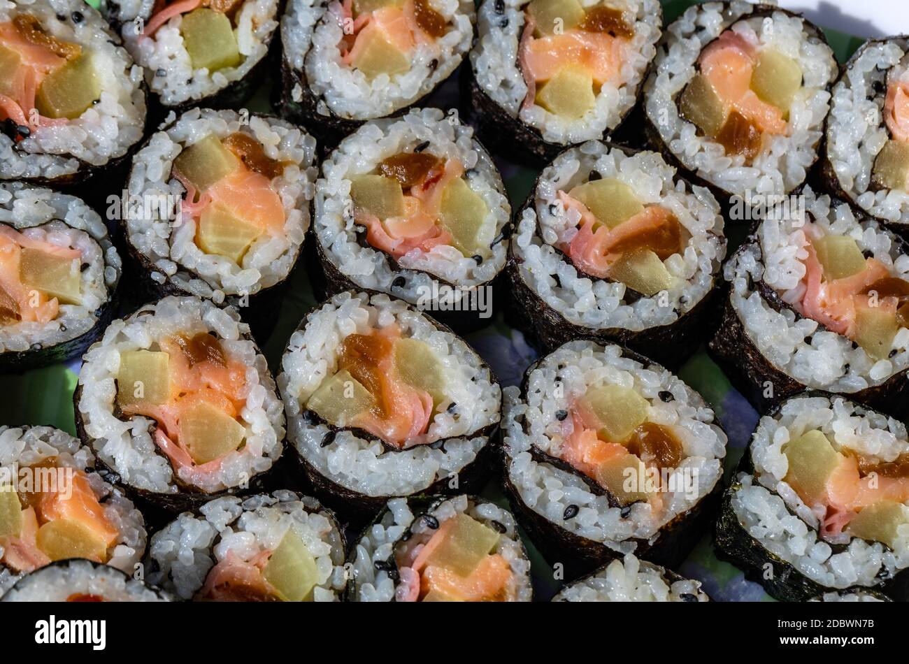 Top view of stack of Japanese sushi maki roll plate. Served in Japanese ...