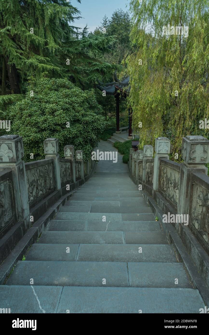 Generic ancient Chinese bridge in forest, in Hangzhou, China Stock ...