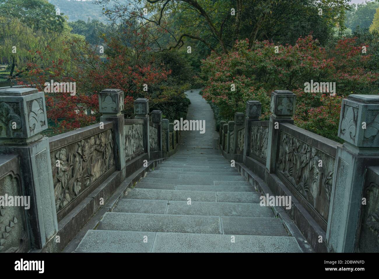 Generic ancient Chinese bridge in forest, in Hangzhou, China Stock ...