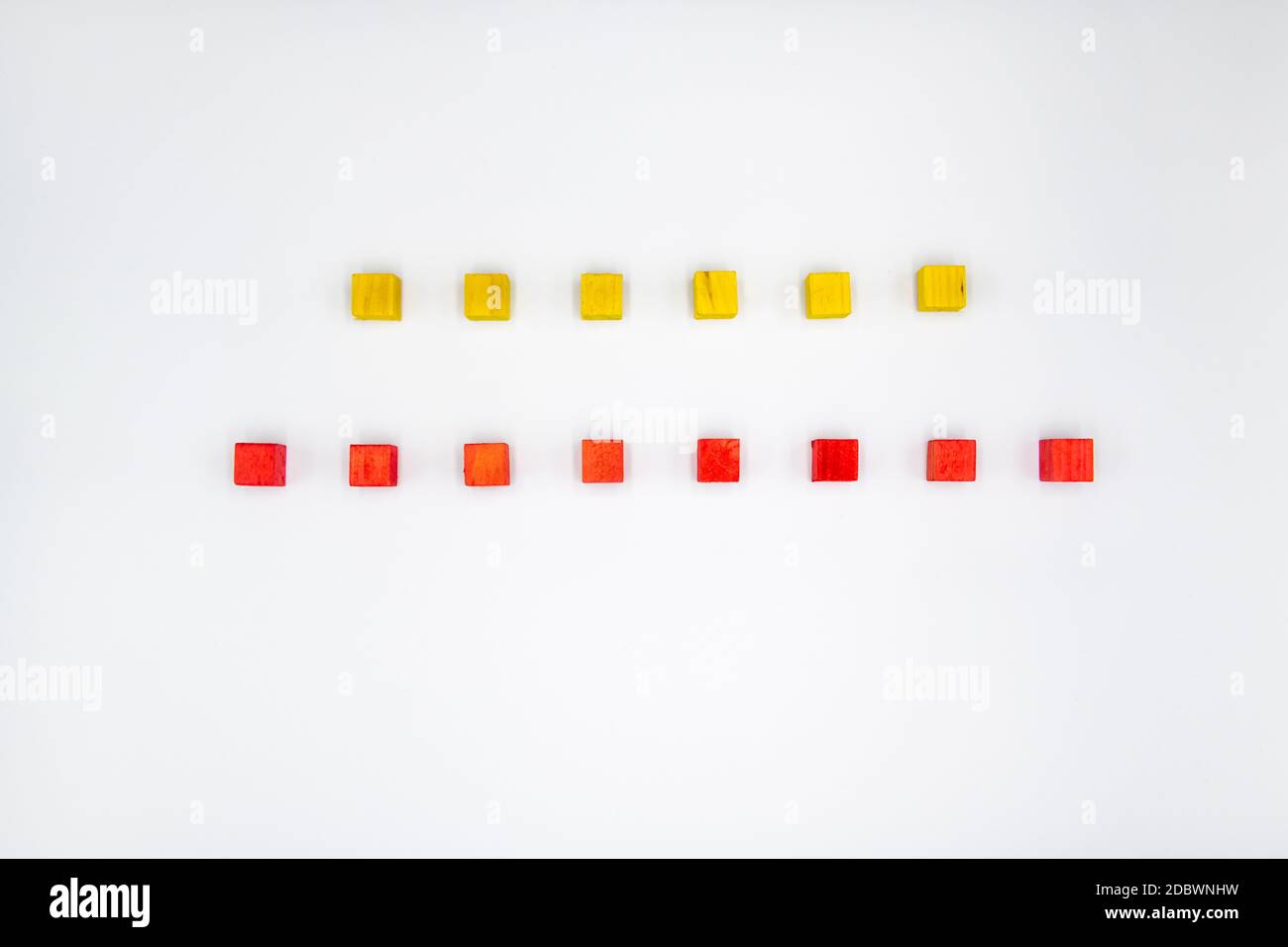 Yellow and red wooden cubes isolated on white background Stock Photo ...