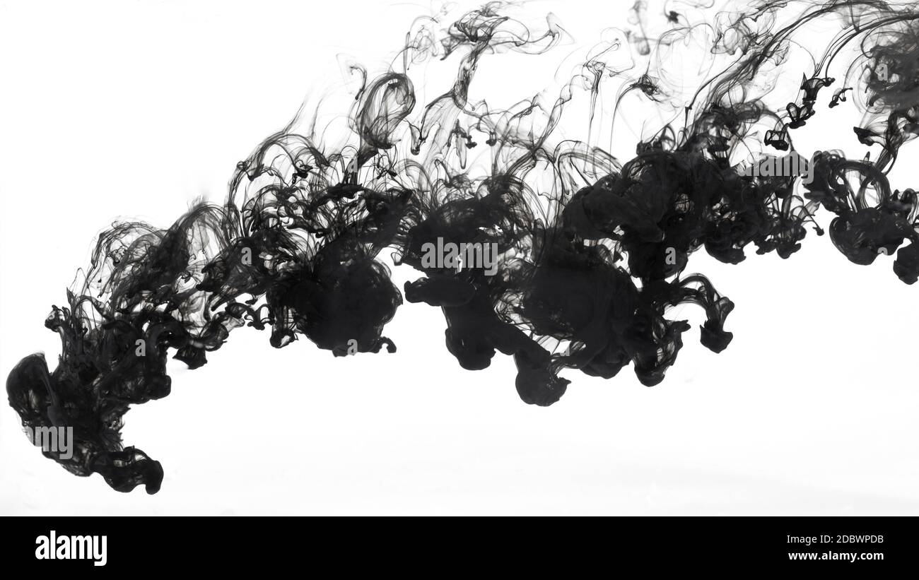 black ink droplet issolated on white background Stock Photo - Alamy