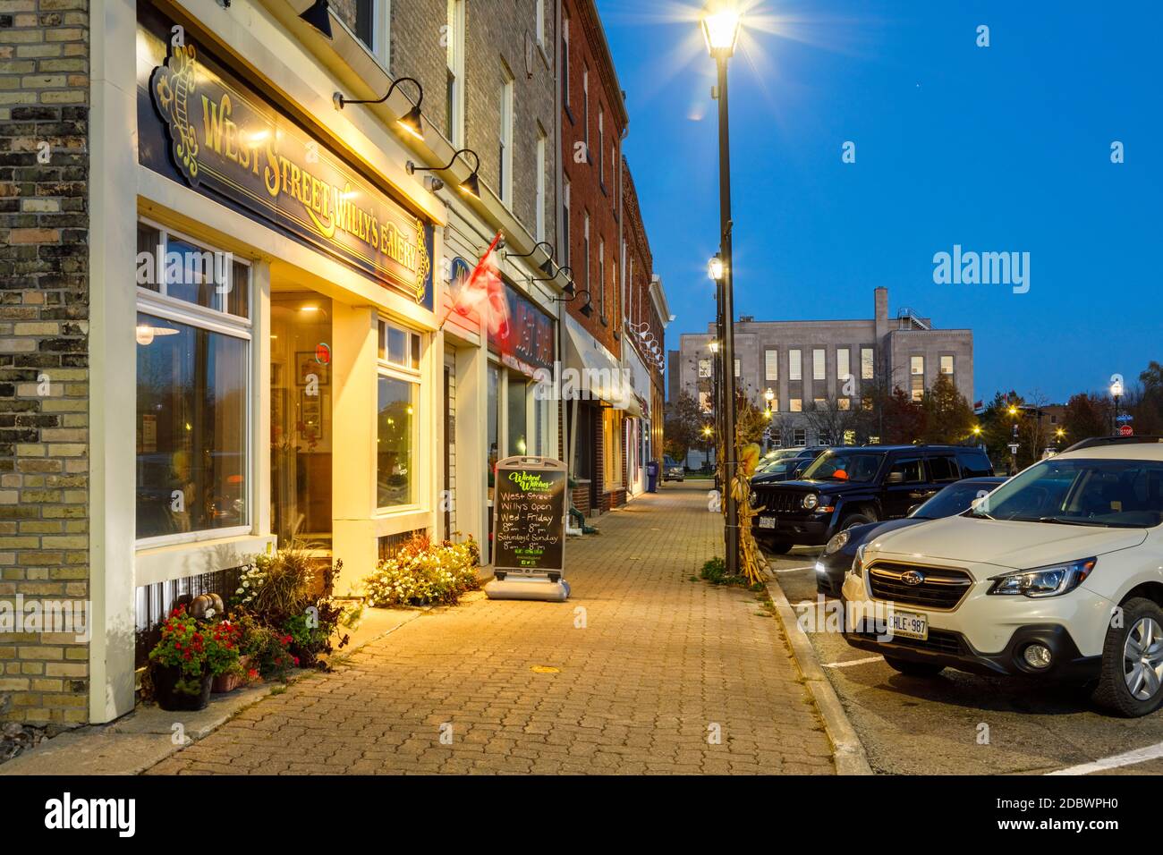 Historical buildings at Courthouse Square at dusk in Downtown Goderich ...