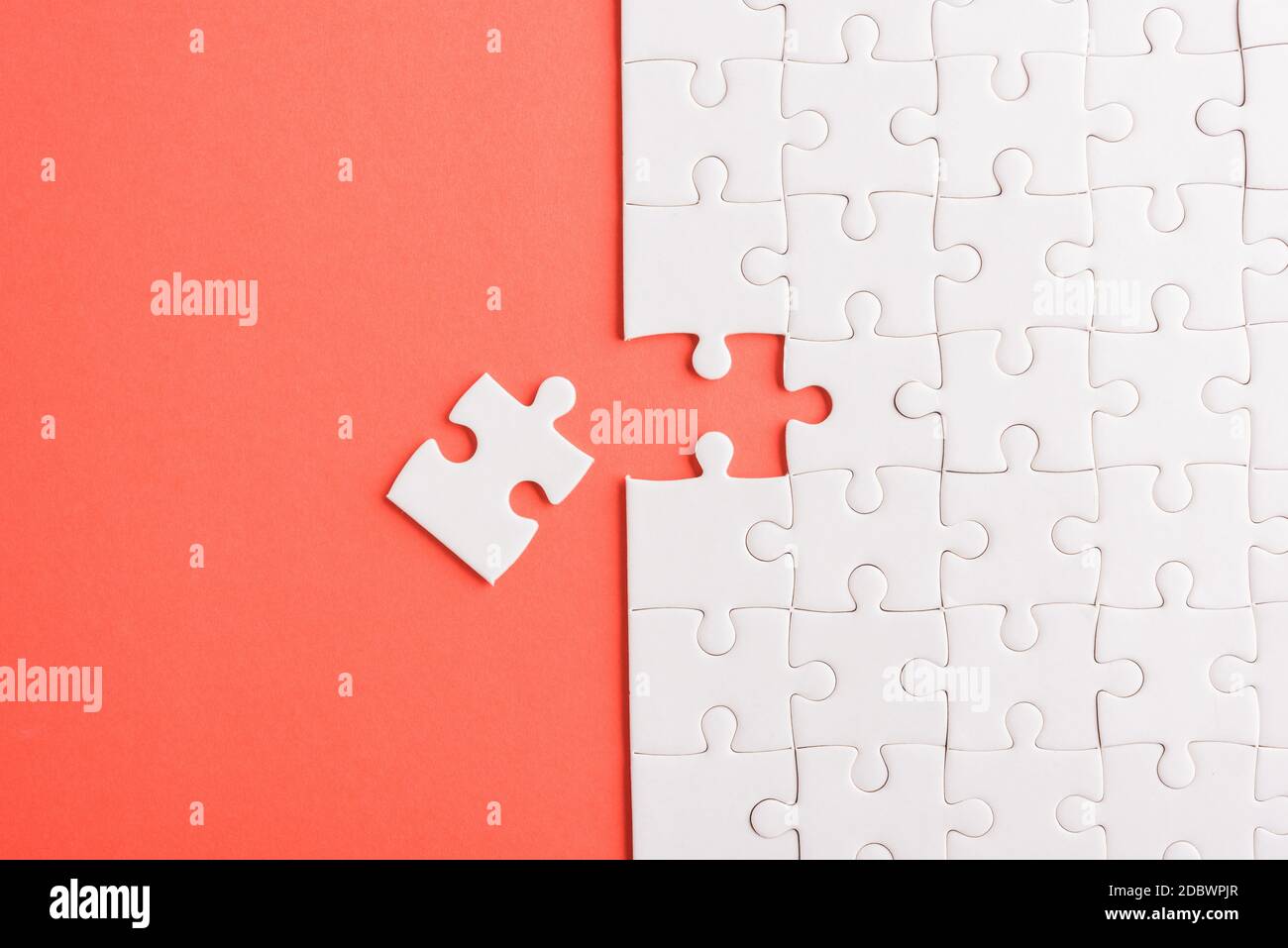 Top view flat lay of paper plain white jigsaw puzzle game texture last ...