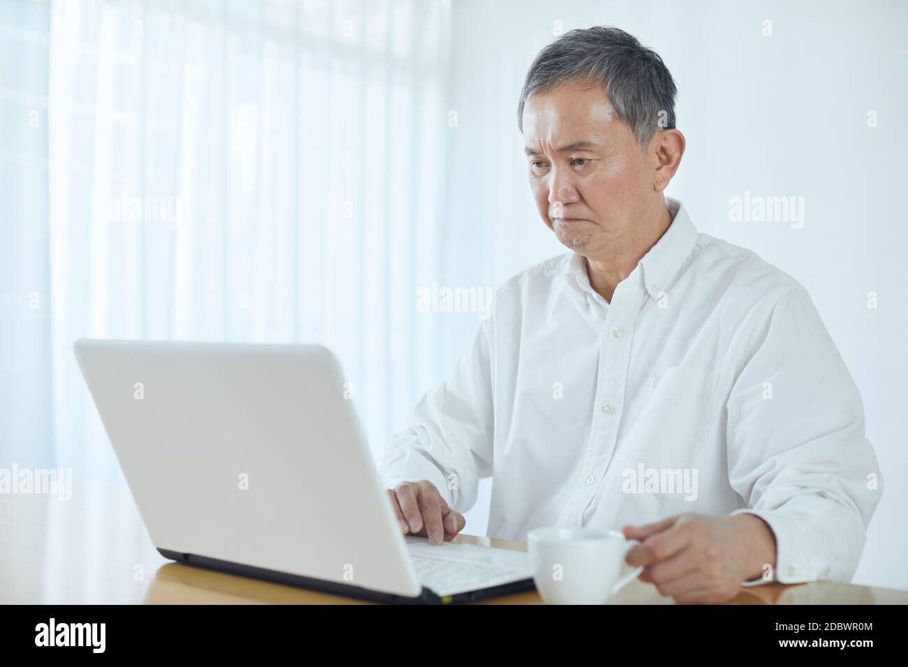 Japanese Senior At Home Stock Photo - Alamy