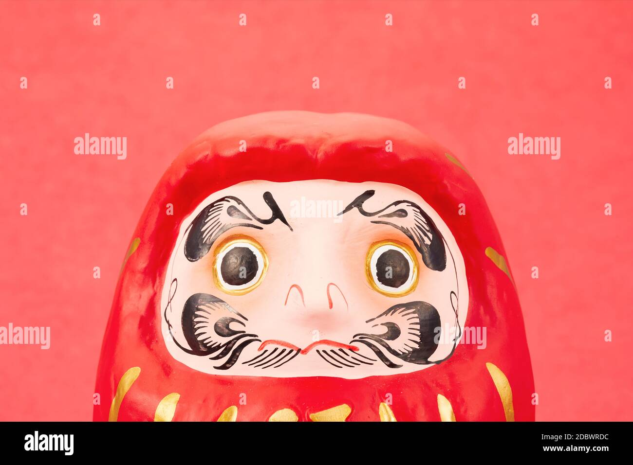 Red Daruma Doll Stock Photo - Alamy