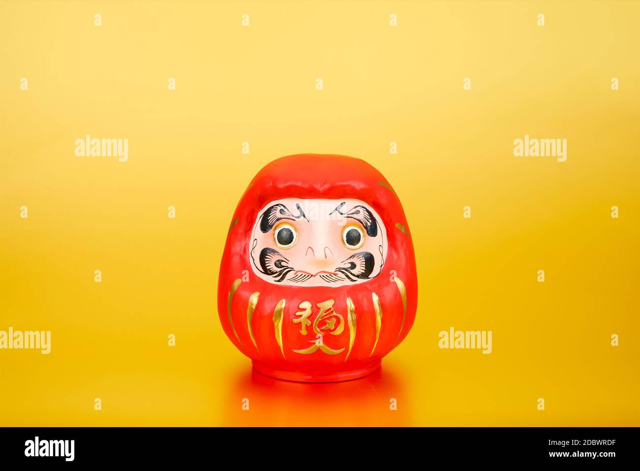Red Daruma Doll Stock Photo - Alamy